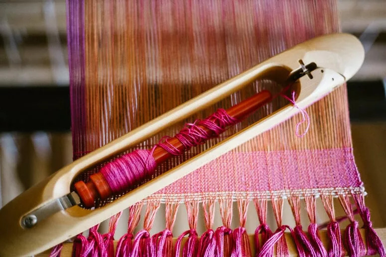 Back to weaving, baby on my back - SweetGeorgia Yarns